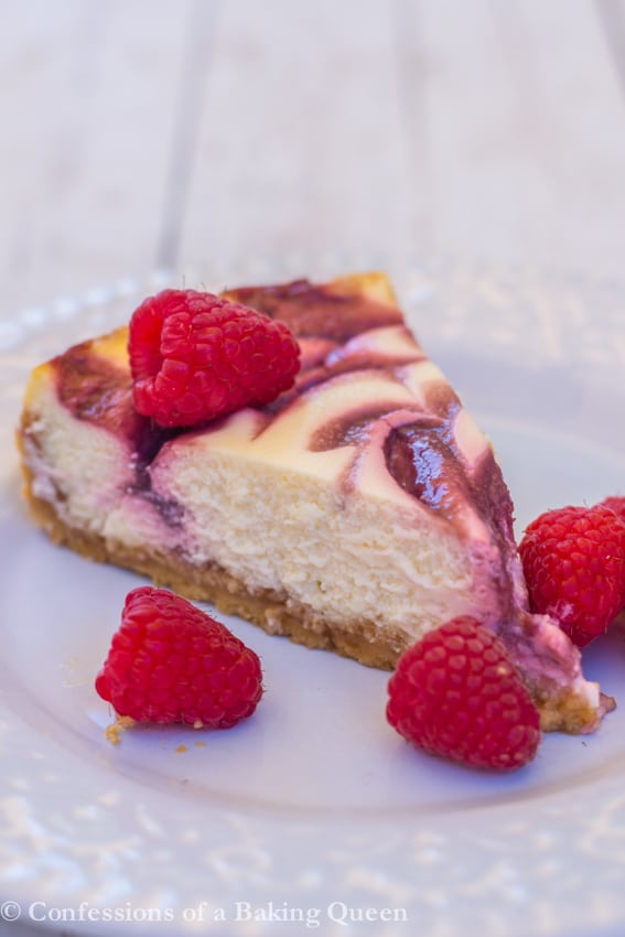 Raspberry Swirl Lemon Cheesecake - Confessions of a Baking Queen